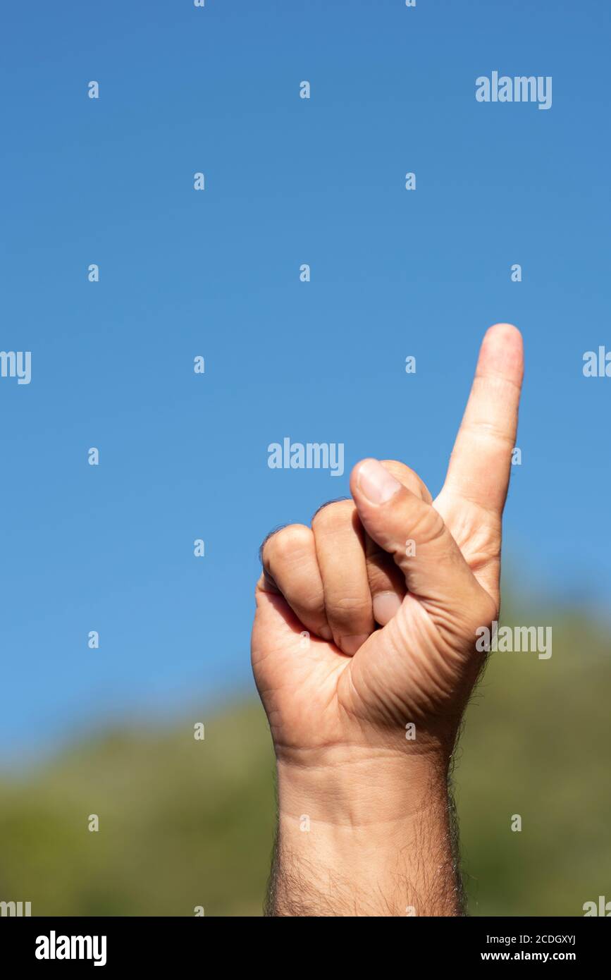 Man's hand showing one Stock Photo - Alamy
