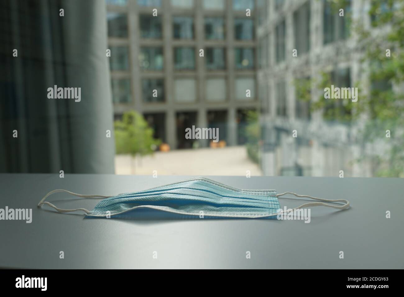 New normal in corporate business means employees equipped with face ...