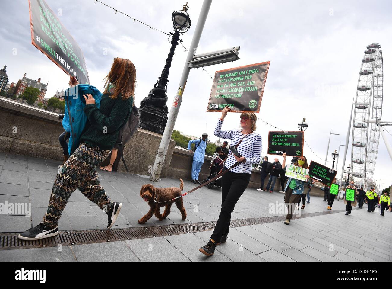 Activists from Extinction Rebellion take part in a protest in London ...