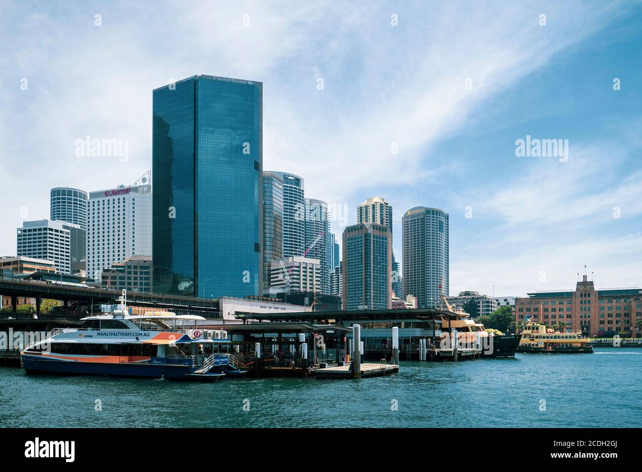 Circular Quay transport hub in downtown Sydney with ferries docking on ...