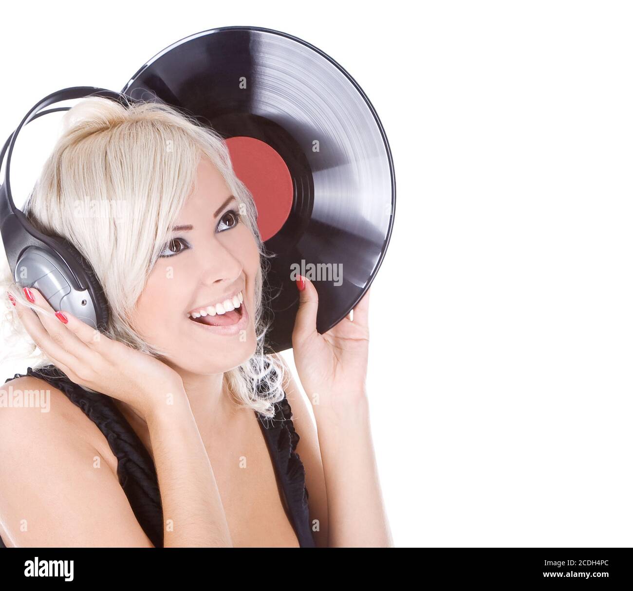 emotional blonde in headphones with vinyl record over white Stock Photo ...
