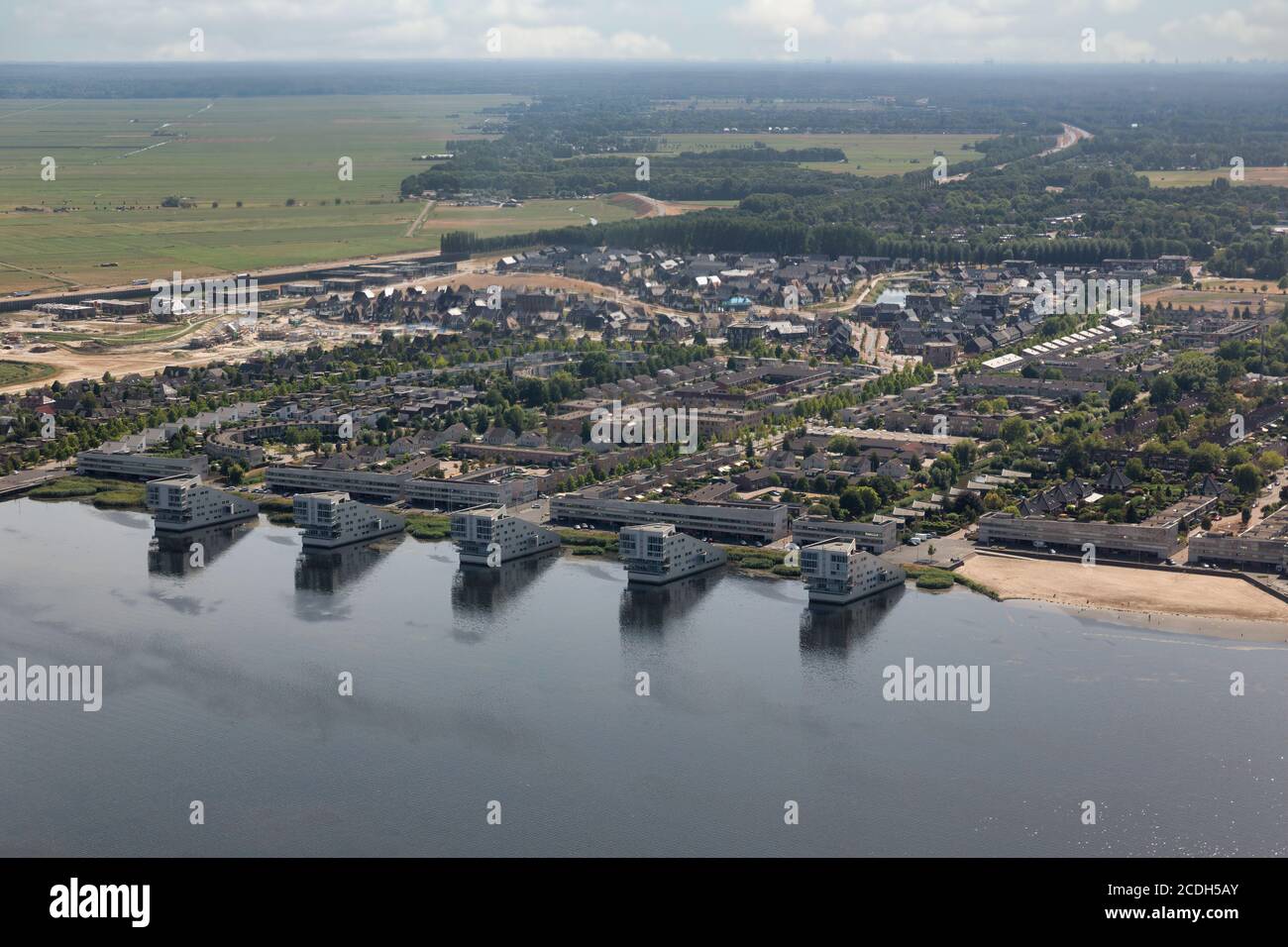 Aerial view Dutch village Huizen at lake with apartment buildings Stock ...