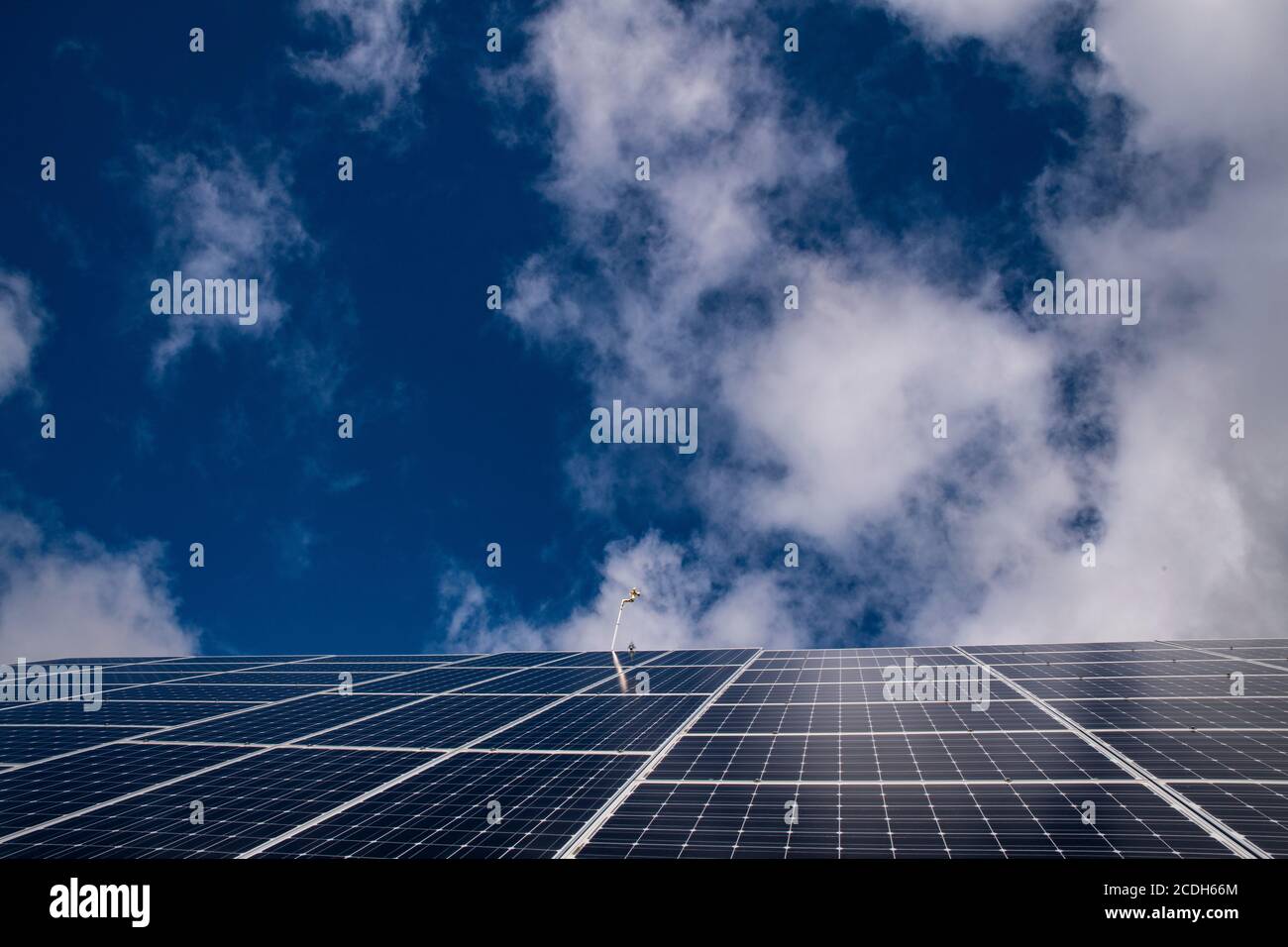 Solar panel beneath storm clouds hi-res stock photography and images ...