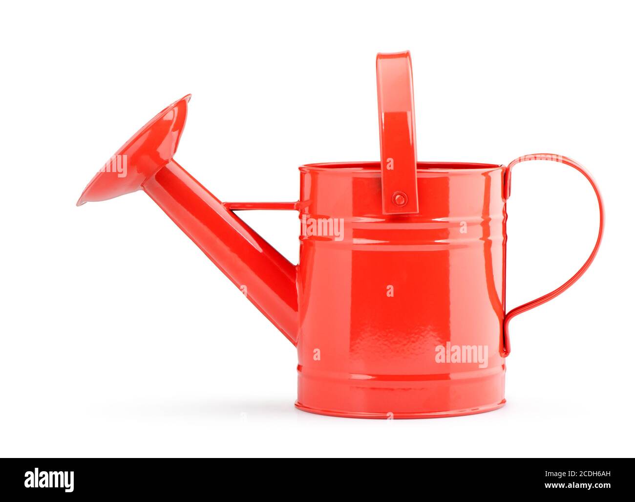 Red watering can Stock Photo - Alamy
