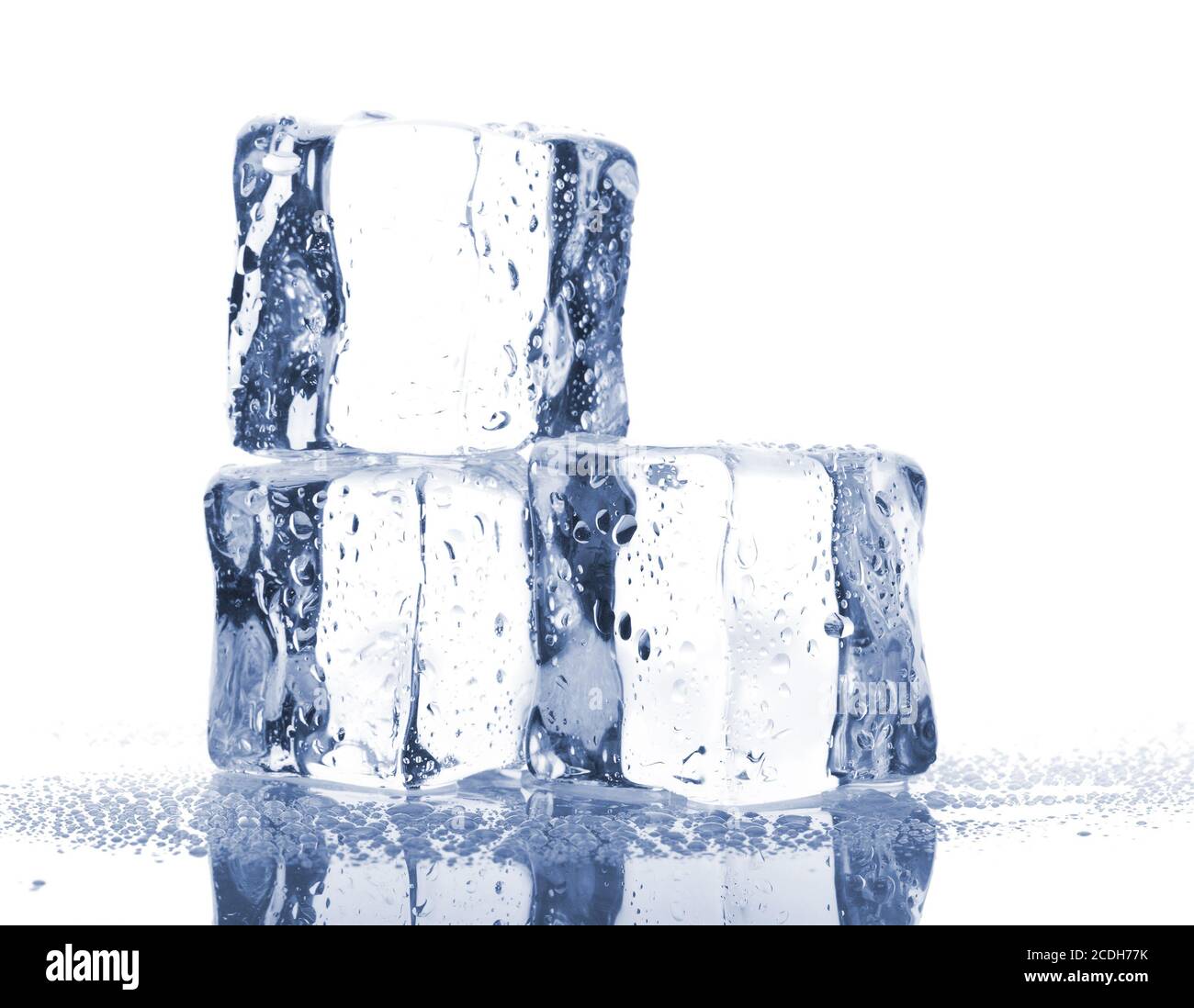 Three ice cubes with water drops Stock Photo - Alamy