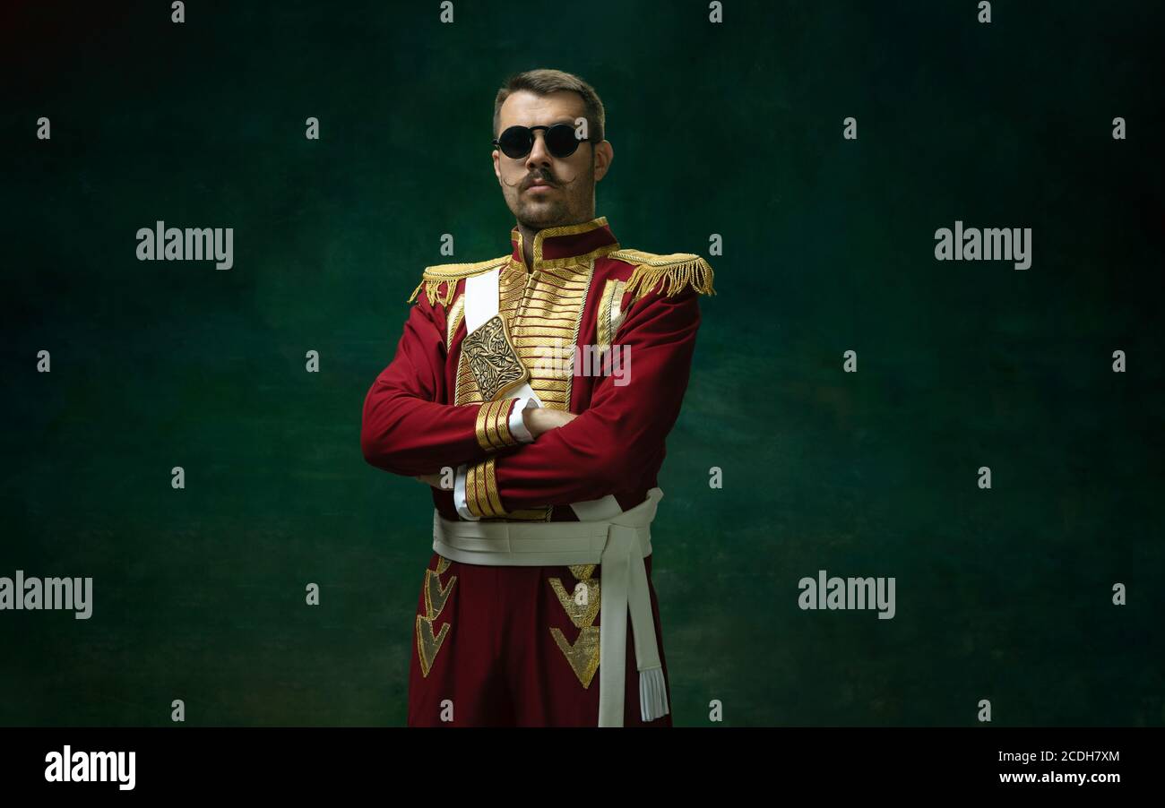 Wearing stylish eyewear. Young man in suit as Nicholas II isolated on ...