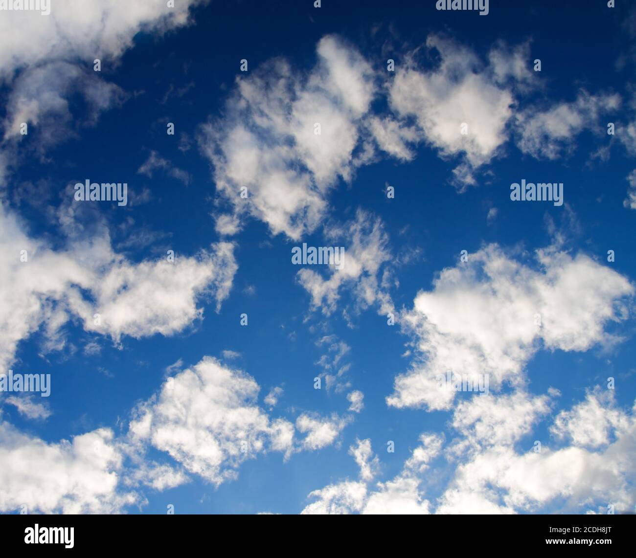 Blue sky lots small clouds hi-res stock photography and images - Alamy