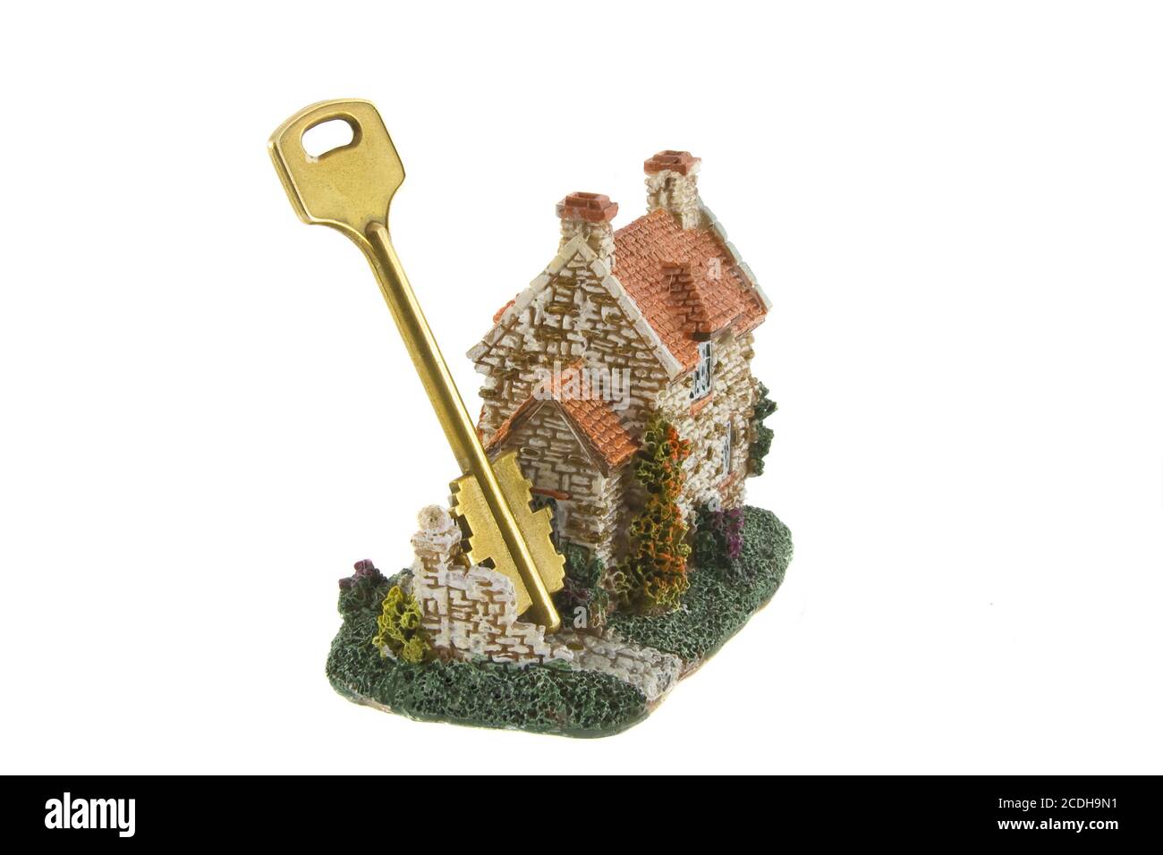 The house with key isolated over white background Stock Photo - Alamy