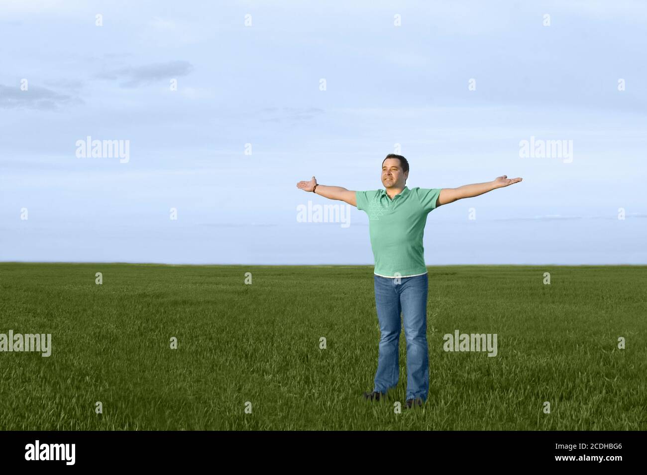 man take energy from nature in the meadow with dark blue sky Stock ...