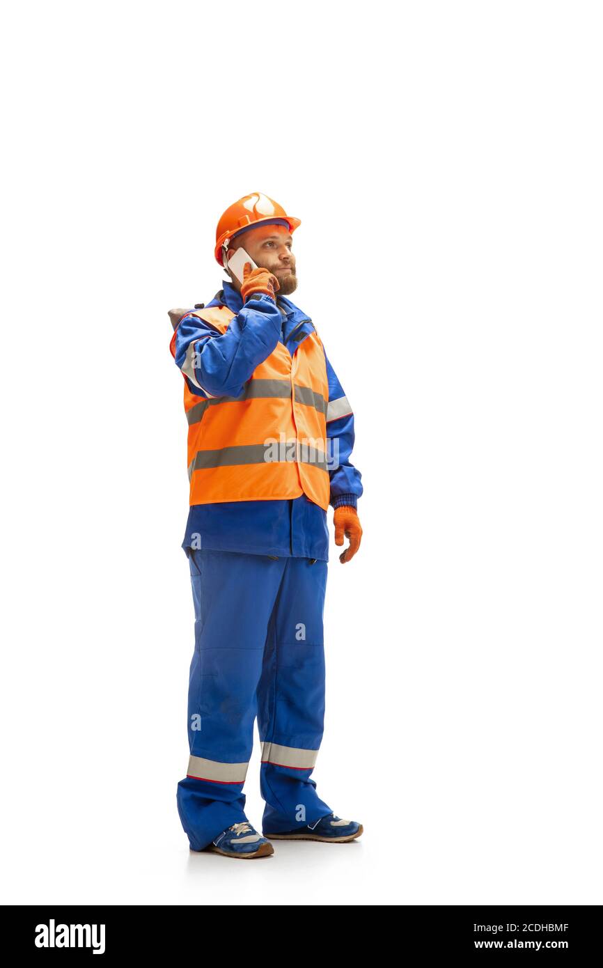 Handsome contractor, builder isolated over white studio background ...
