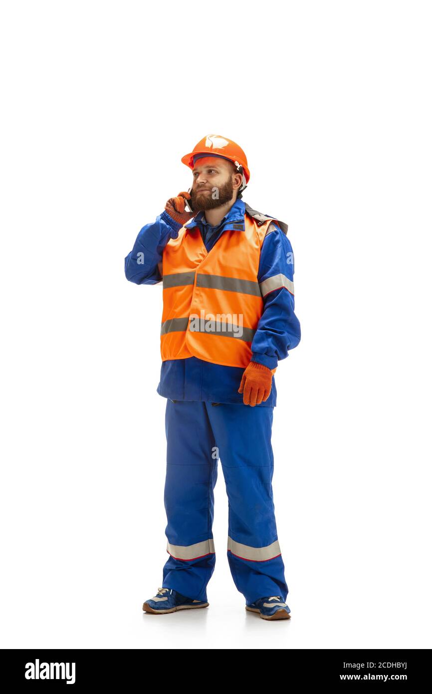 Handsome contractor, builder isolated over white studio background ...