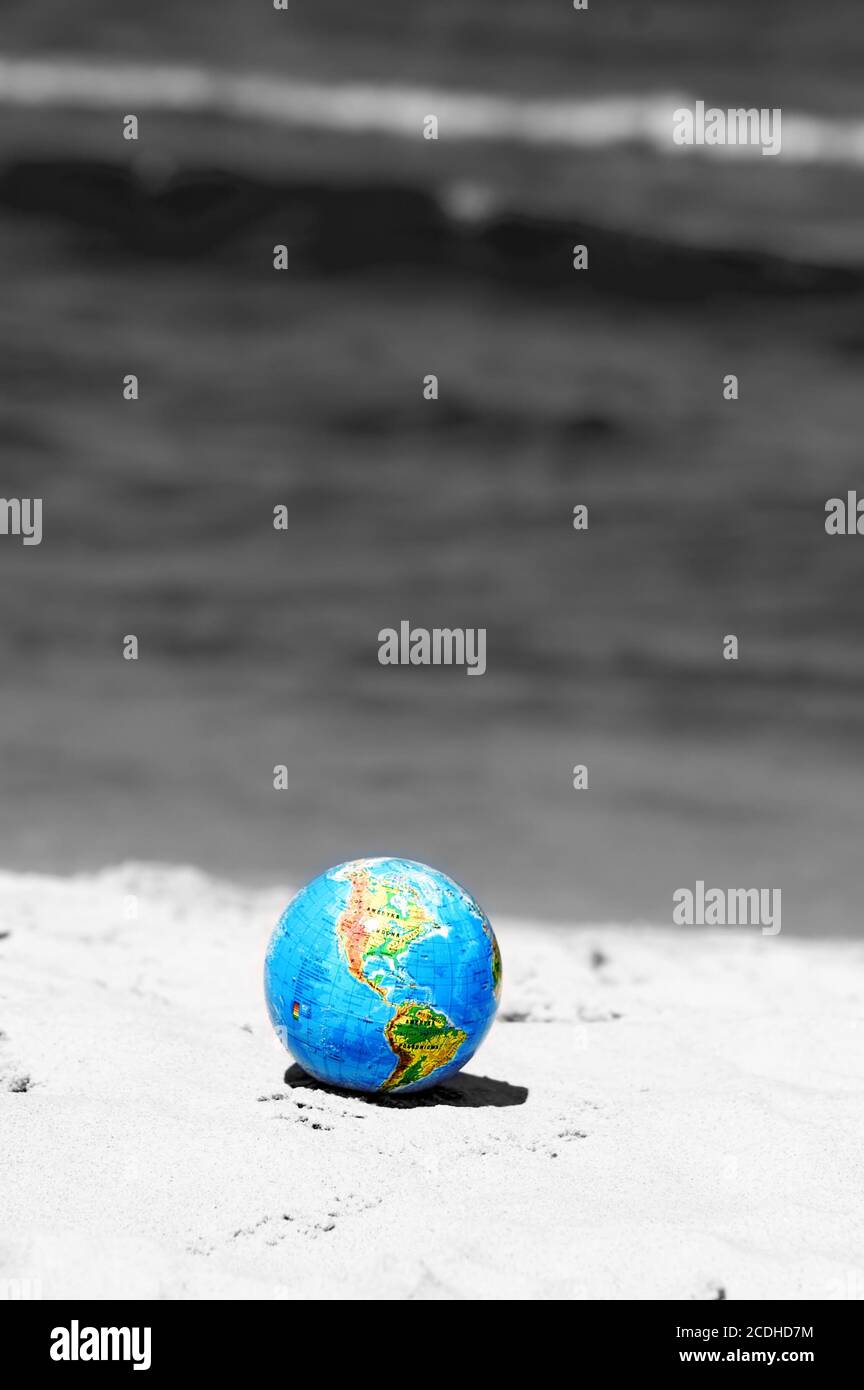 Earth globe on the beach. Ideal for Earth protection concepts Stock ...