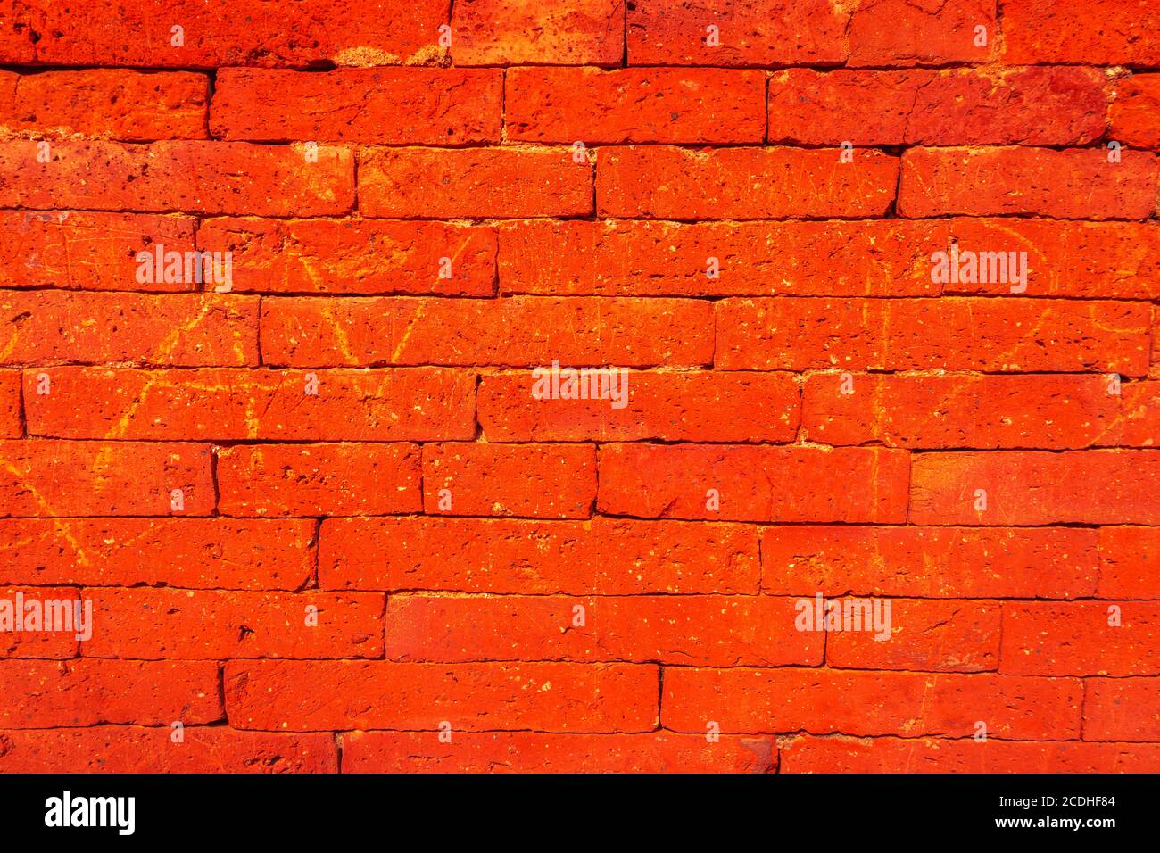 red bricks background wallpaper in details Stock Photo - Alamy