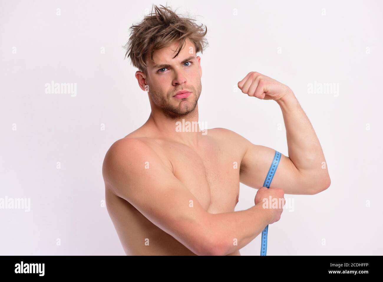 Guy with flexible ruler isolated on white background. Measurement and ...