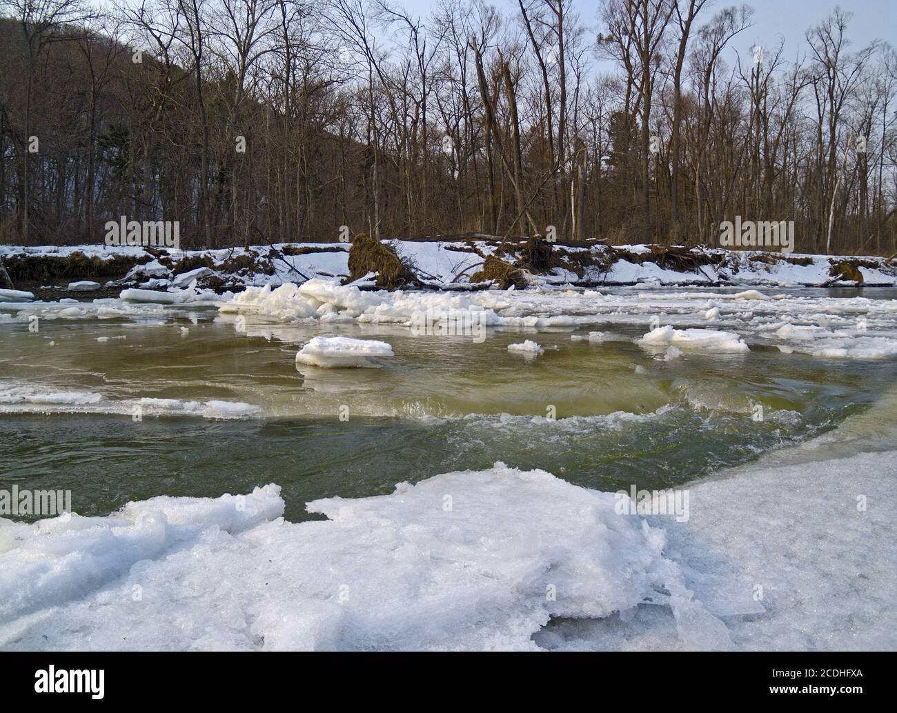 The destroyed ice on spring river Stock Photo - Alamy