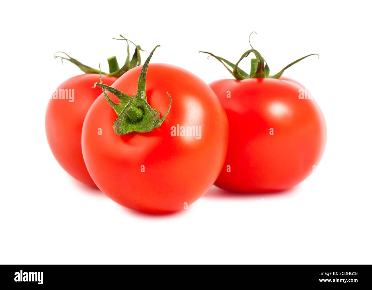 Three fresh tomatoes Stock Photo - Alamy