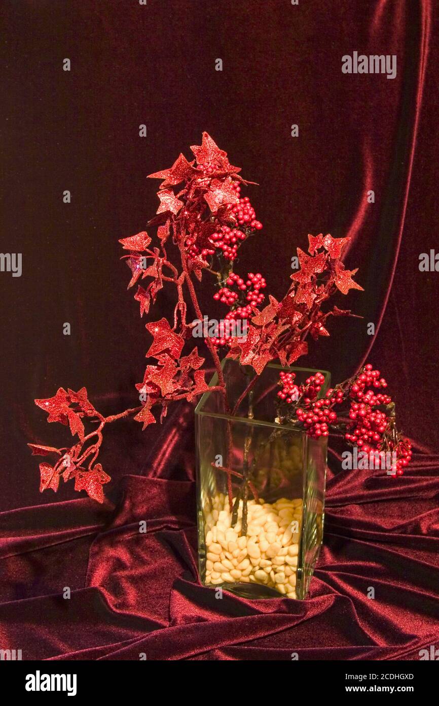 still life in red tones with vase in modern style Stock Photo - Alamy
