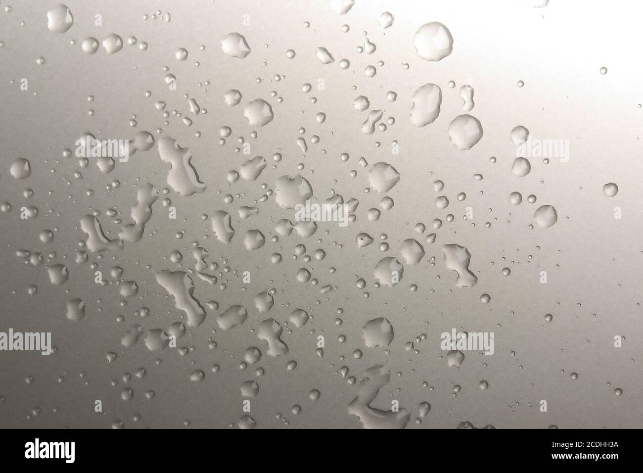texture from transparent drops on beige metal Stock Photo - Alamy