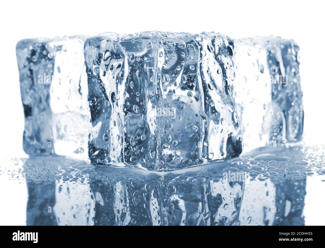 Three ice cubes with water drops Stock Photo - Alamy