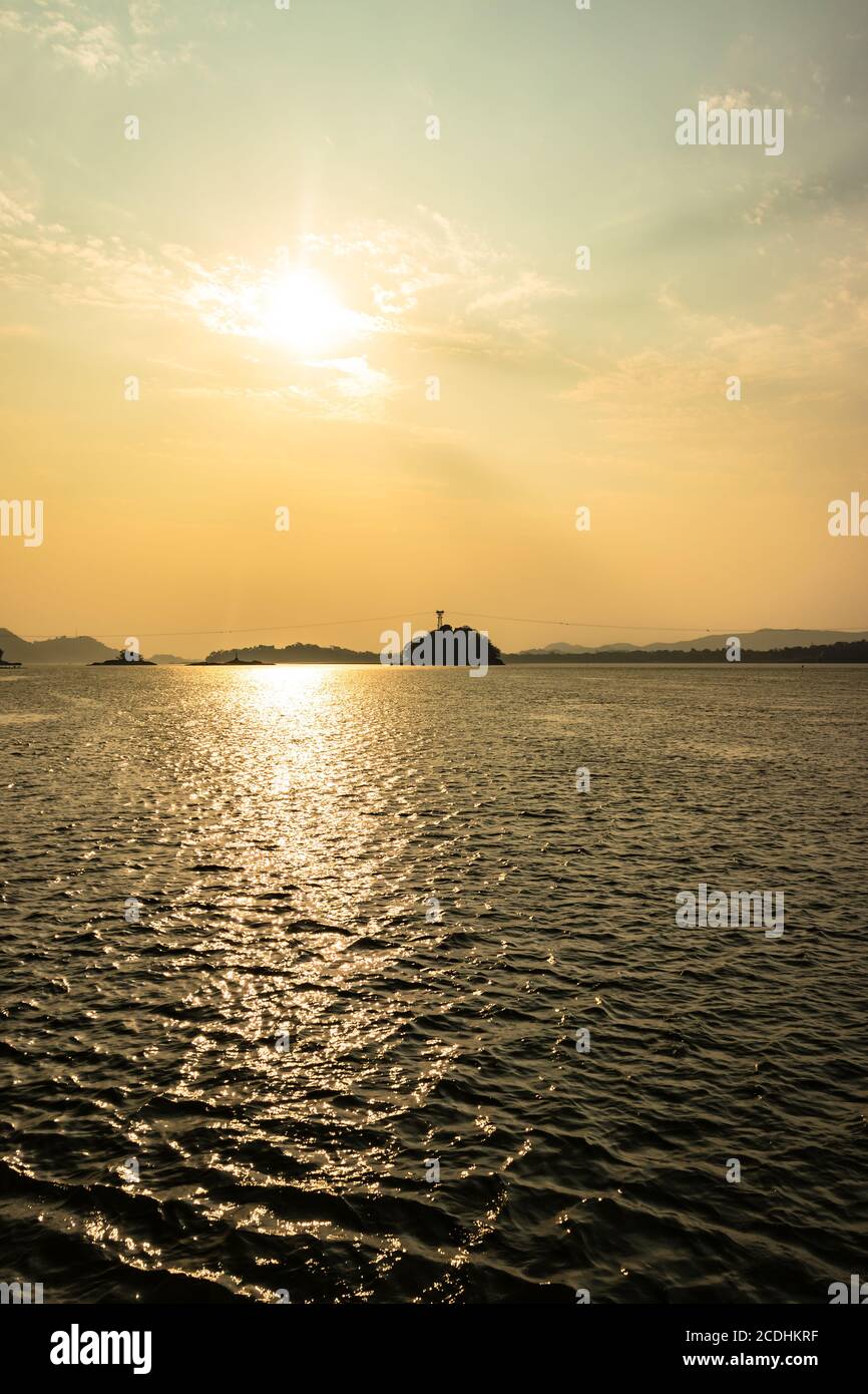 sunset orange sky with river island backdrop at dusk image is taken at ...