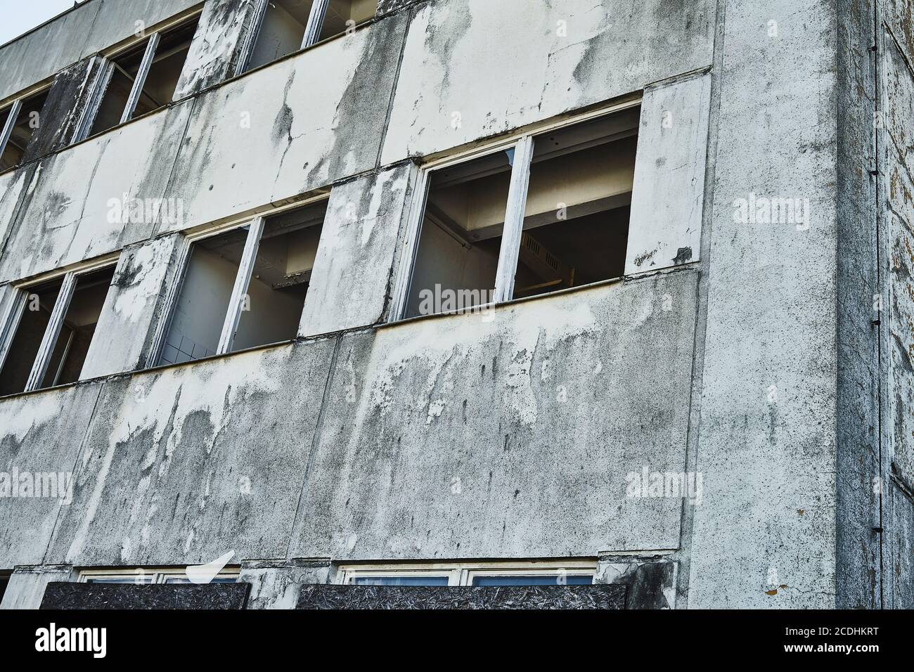 Demolished old neglected building with open windows Stock Photo - Alamy