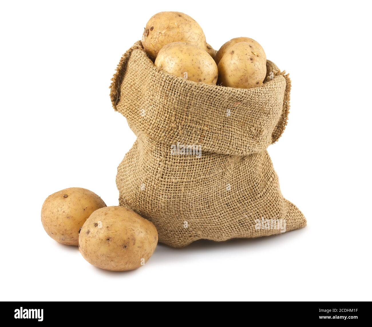 Raw potatoes in burlap sack Stock Photo - Alamy