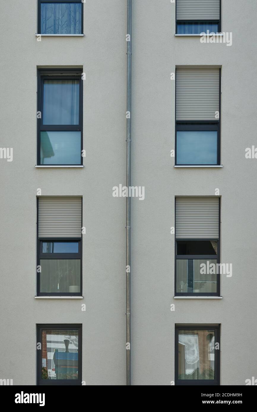 Strict looking perfectly rectangular facade of a residential building ...