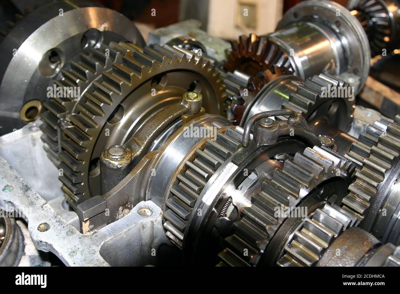 Set linked metal gears the automobile mechanism in Stock Photo - Alamy