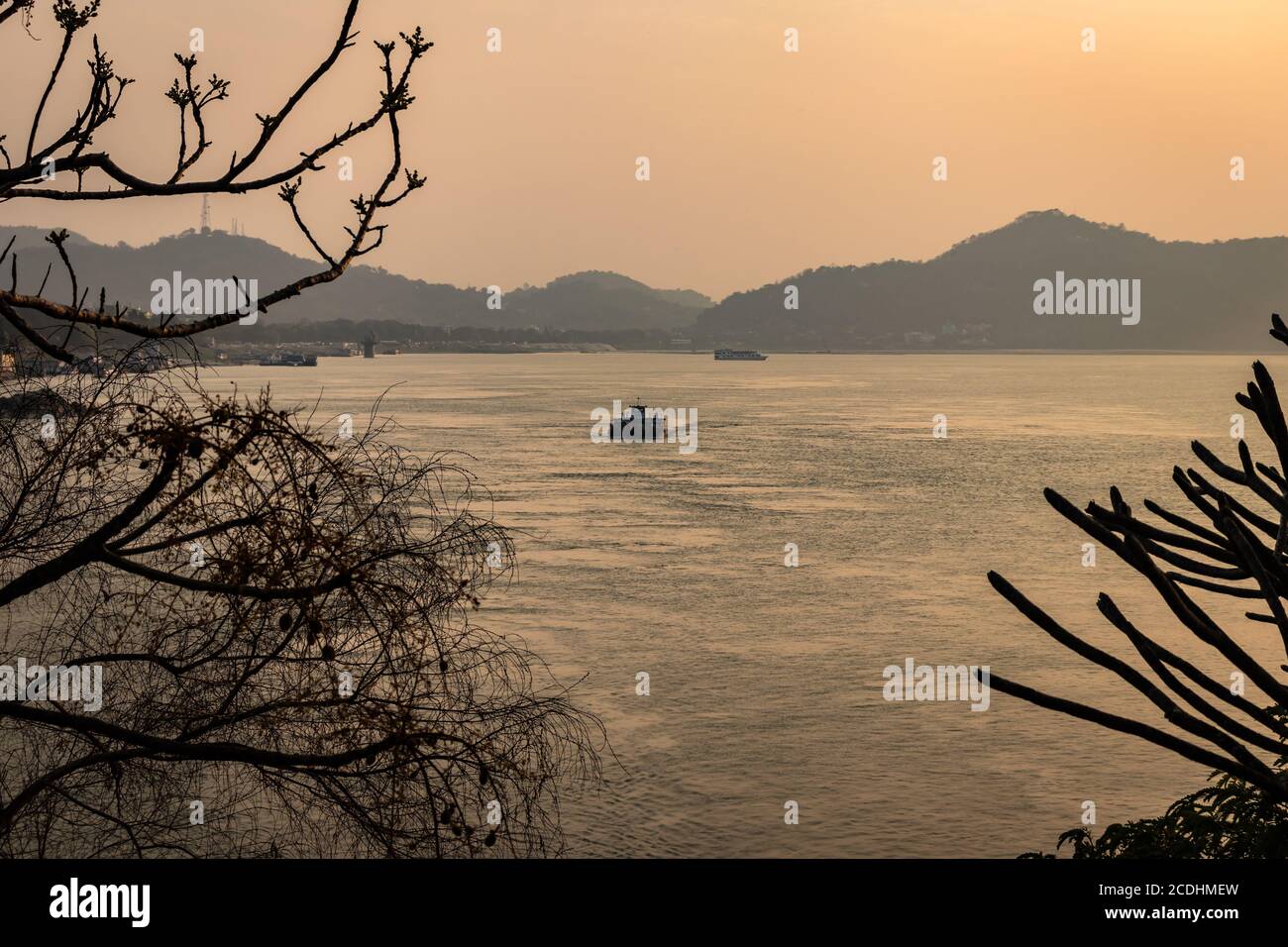 sunset orange sky with tree shadow at dusk image is taken at peacock ...