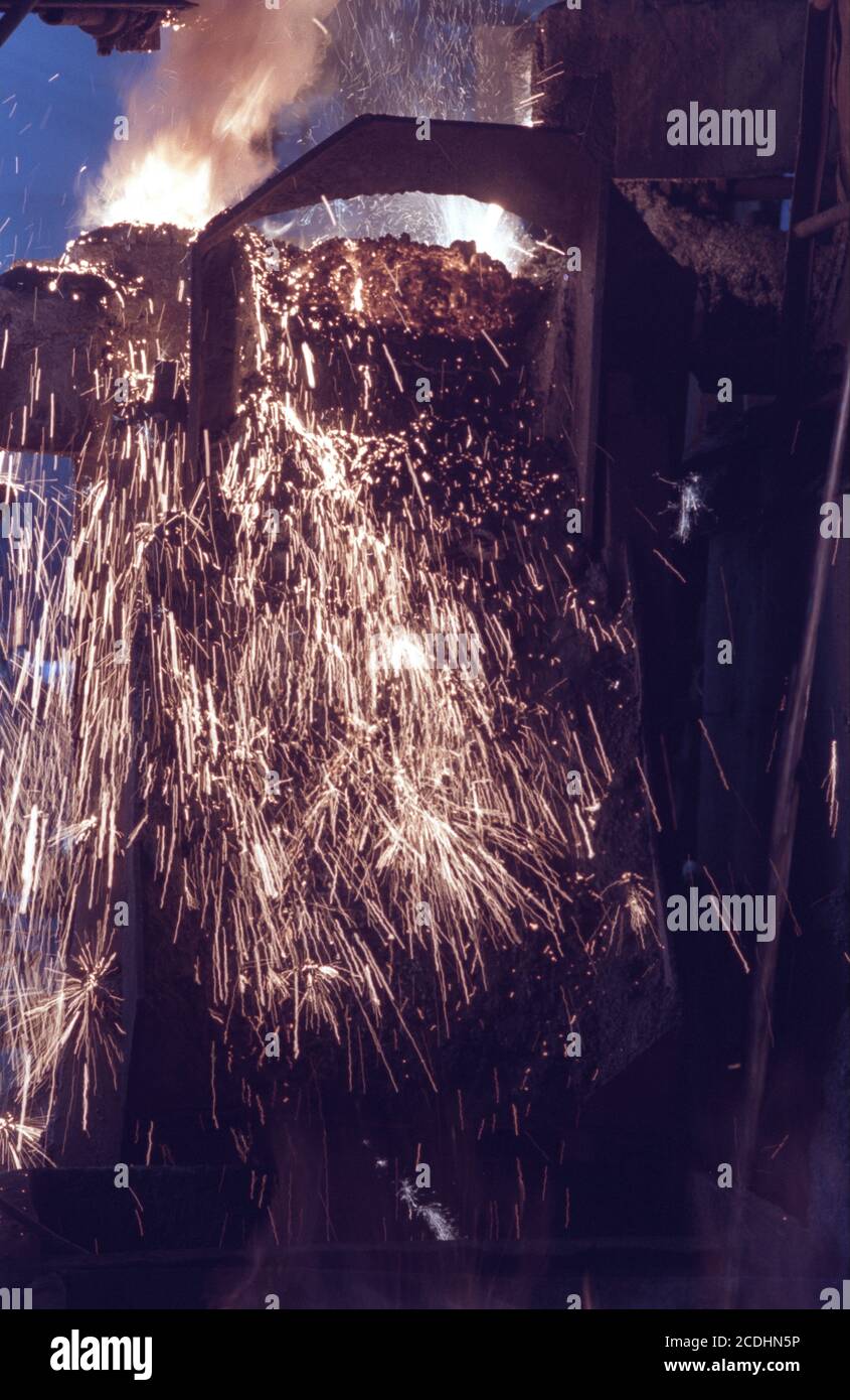 Glowing molten metal pouring from hi-res stock photography and images ...