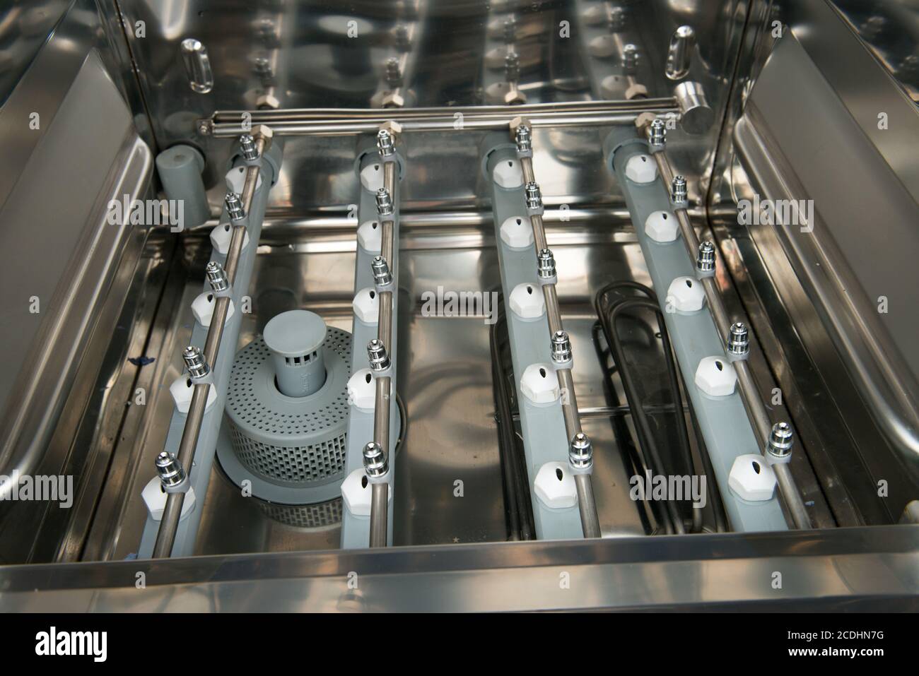 Inside a professional industrial dishwasher Stock Photo - Alamy
