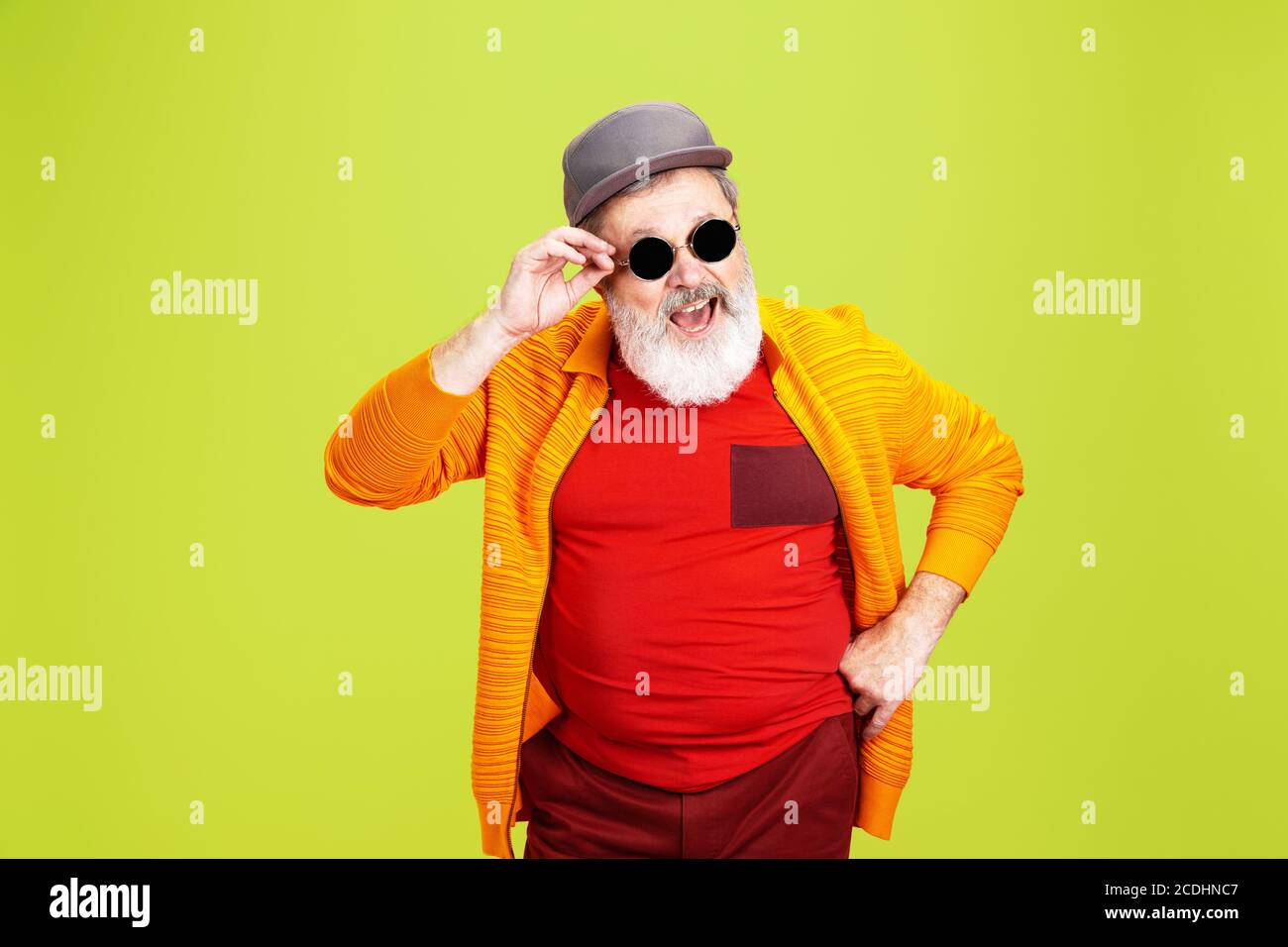 Dancer. Portrait of senior hipster man in fashionable eyewear isolated ...