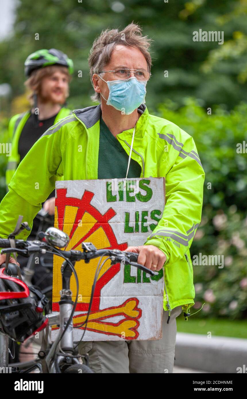 London, UK. 28th August 2020. Cyclists from Extinction Rebellion arrive ...