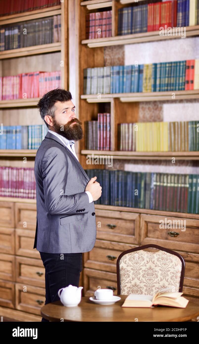 Successful lawyer concept. Lawyer standing in his home library Stock ...