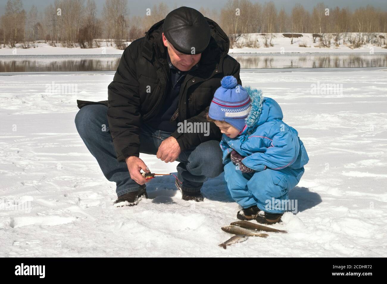 Ice fishing child hi-res stock photography and images - Alamy