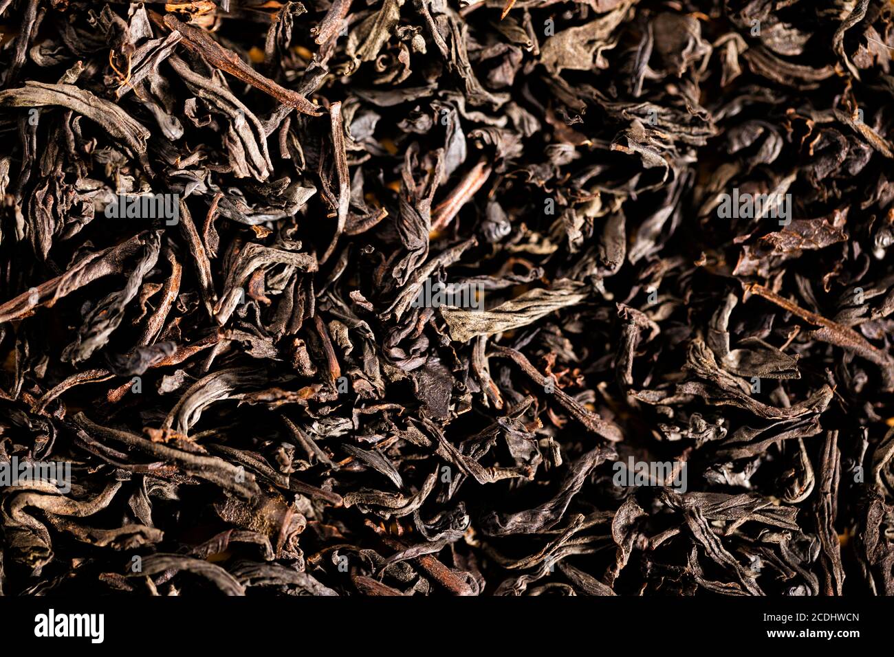 Black tea leaf close-up texture Stock Photo - Alamy