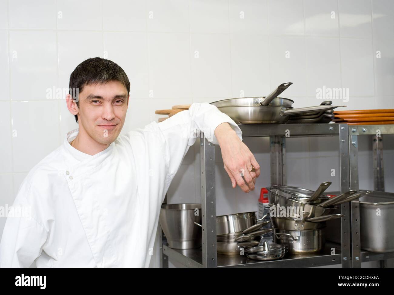 chef smiles into camera Stock Photo - Alamy