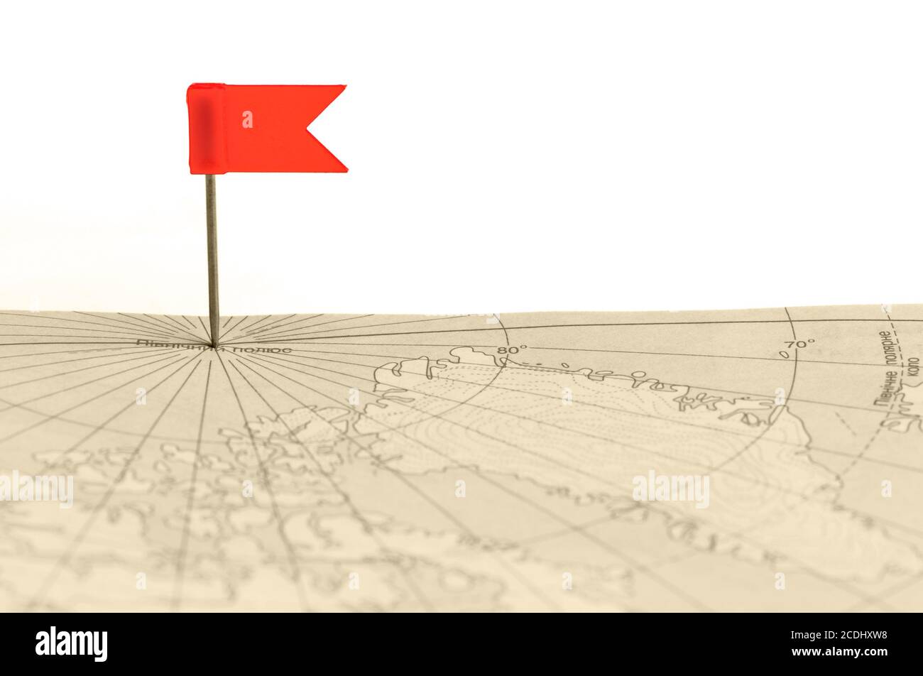 red flag a pin on old map Stock Photo - Alamy
