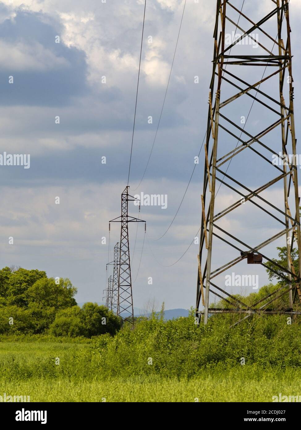 The Tower of electric power line at solar year day Stock Photo - Alamy