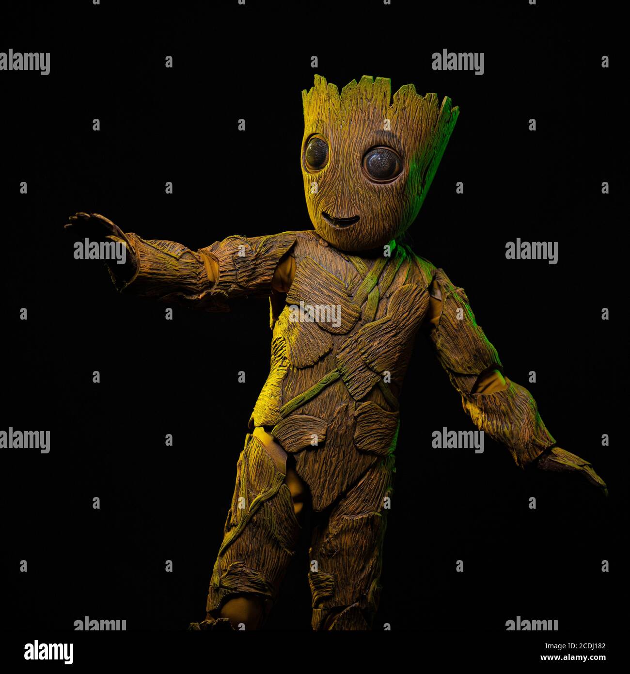 Big toy character, costume tree with twigs and flowers Stock Photo - Alamy