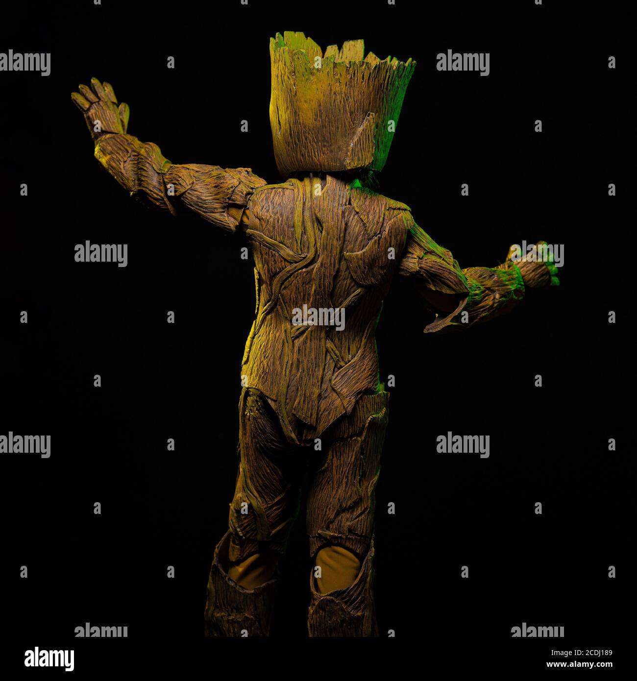 Big toy character, costume tree with twigs and flowers Stock Photo - Alamy