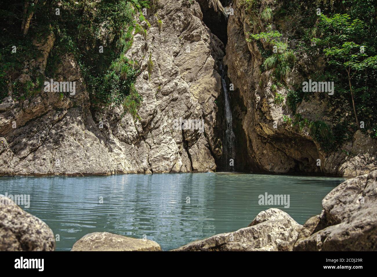 High mountain with a waterfall.Mountain landscape in summer. Russia ...