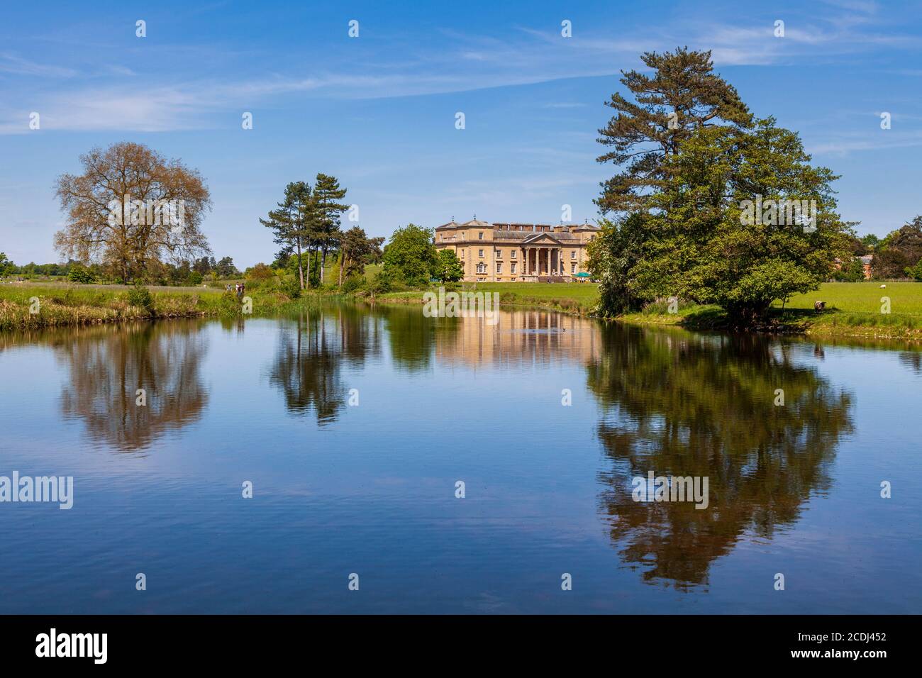 Croome Court reflecting in the Croome River in summer, Worcestershire ...