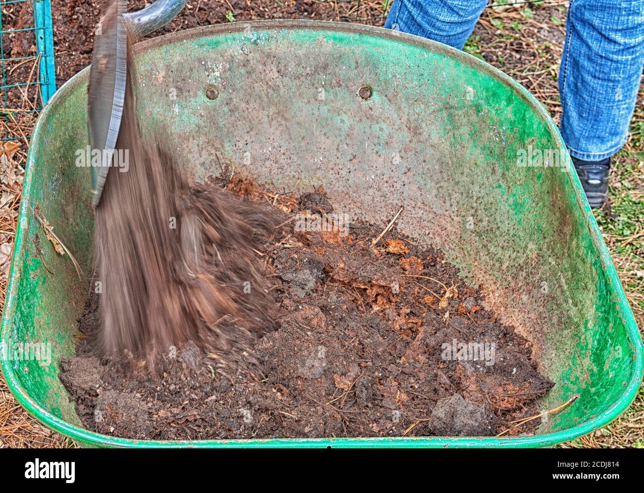 Wheelbarrow, Shovel and Compost Stock Photo - Alamy