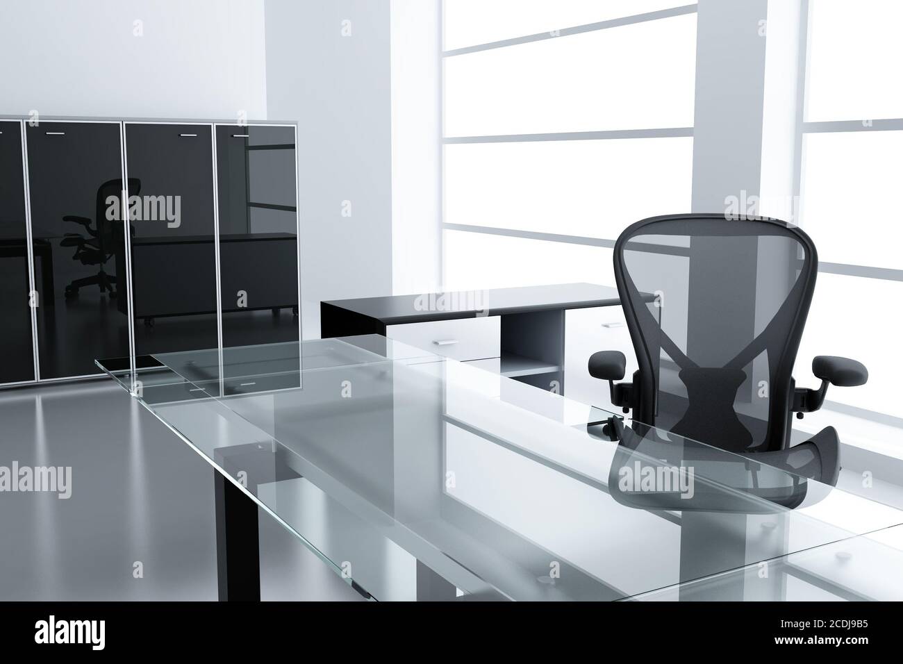 Light modern cubicle with a table and an armchair Stock Photo - Alamy