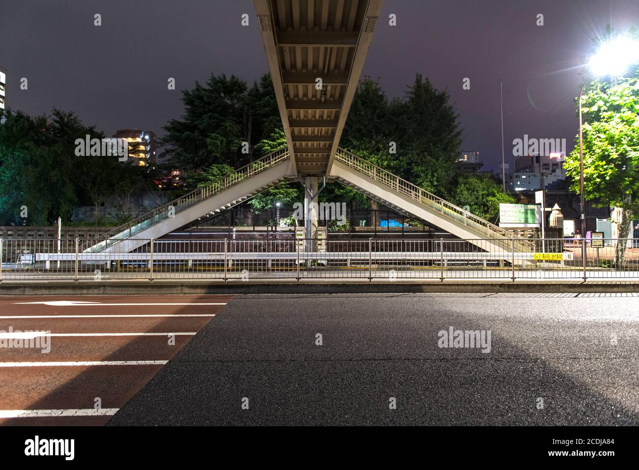 pedestrian bridge over empty road in Tokyo Stock Photo - Alamy