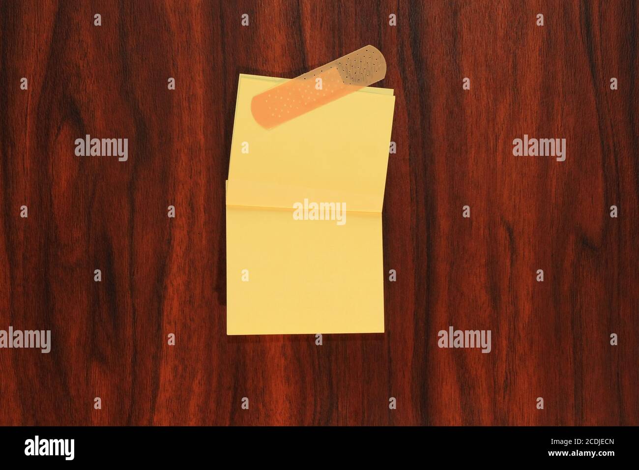 Yellow note paper Stock Photo - Alamy