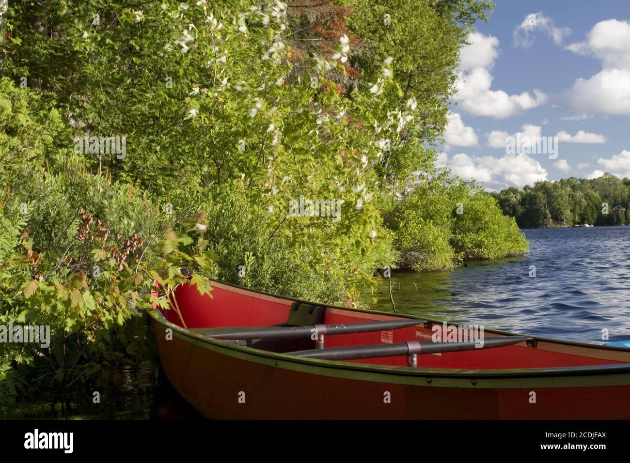 Canoe on edge beach hi-res stock photography and images - Alamy