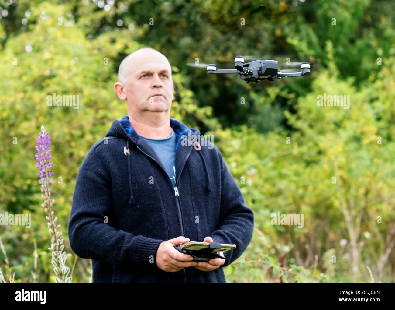 Man launching drone hi-res stock photography and images - Alamy