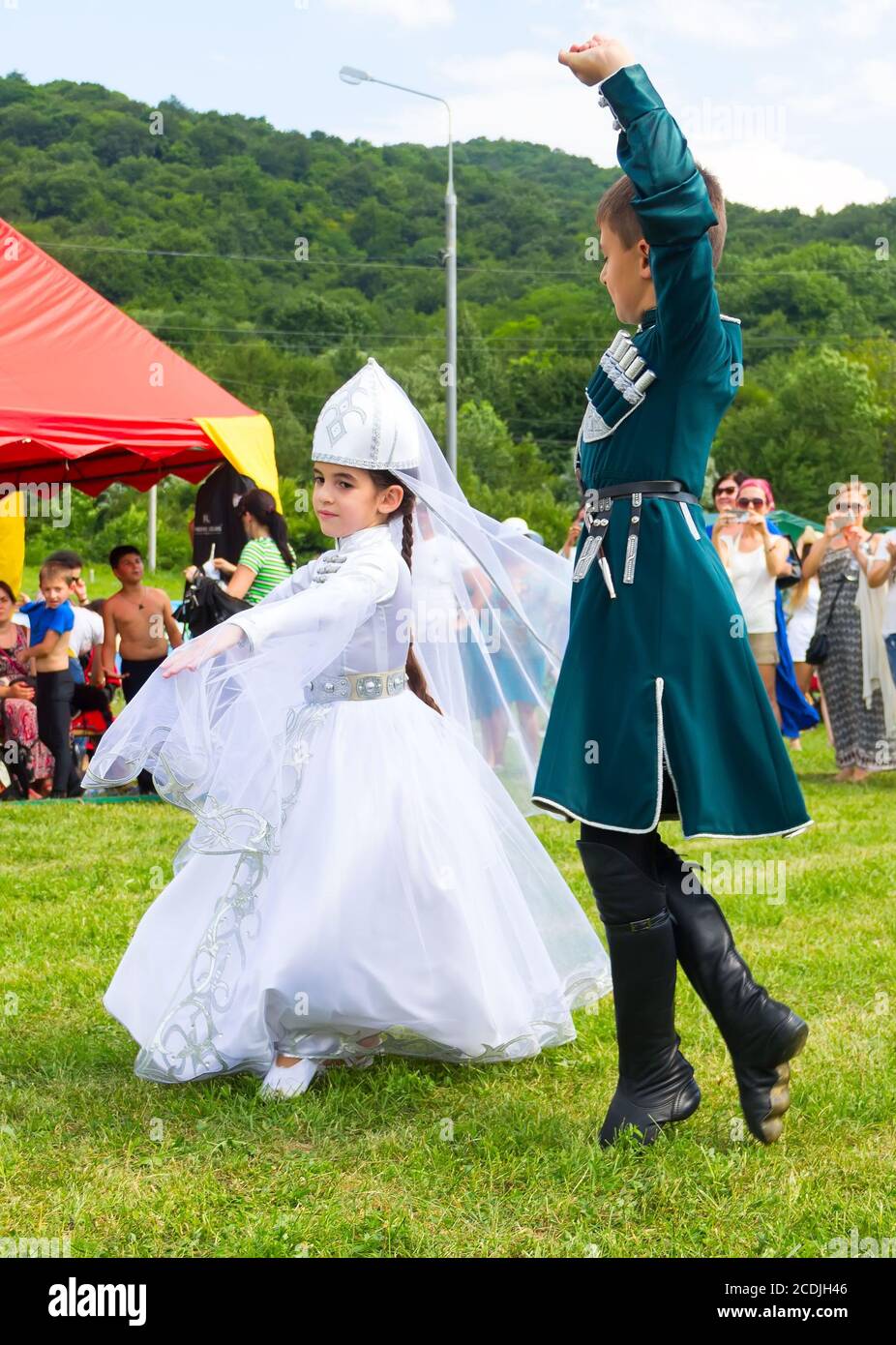 DAKHOVSKY, RUSSIA - JULY 25 2015: The boy and the girl in beautiful ...